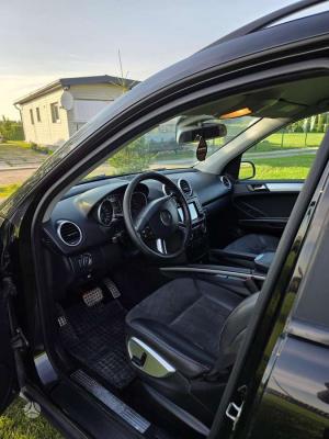 Black Mercedes-Benz ML 320 2007 in Kaunas, with an engine capacity of 3.00 L and mileage of 340 thousand km for 3300 €, photo 13 on AUTOMOTO.COM.LV