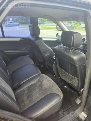 Black Mercedes-Benz ML 320 2007 in Riga, with an engine capacity of 3.00 L and mileage of 300 thousand km for 4200 €, photo 7 on AUTOMOTO.COM.LV