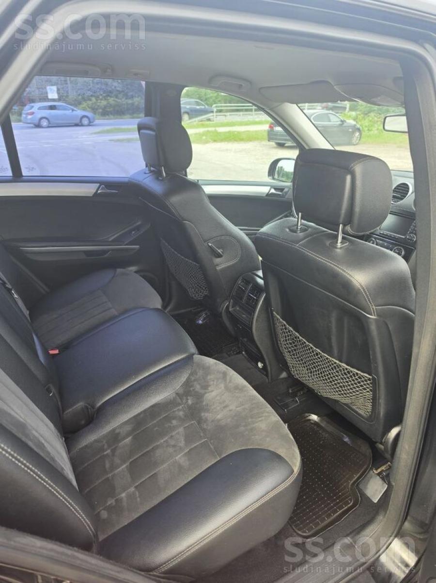 Black Mercedes-Benz ML 320 2007 in Riga, with an engine capacity of 3.00 L and mileage of 300 thousand km for 4200 €, photo 7 on AUTOMOTO.COM.LV