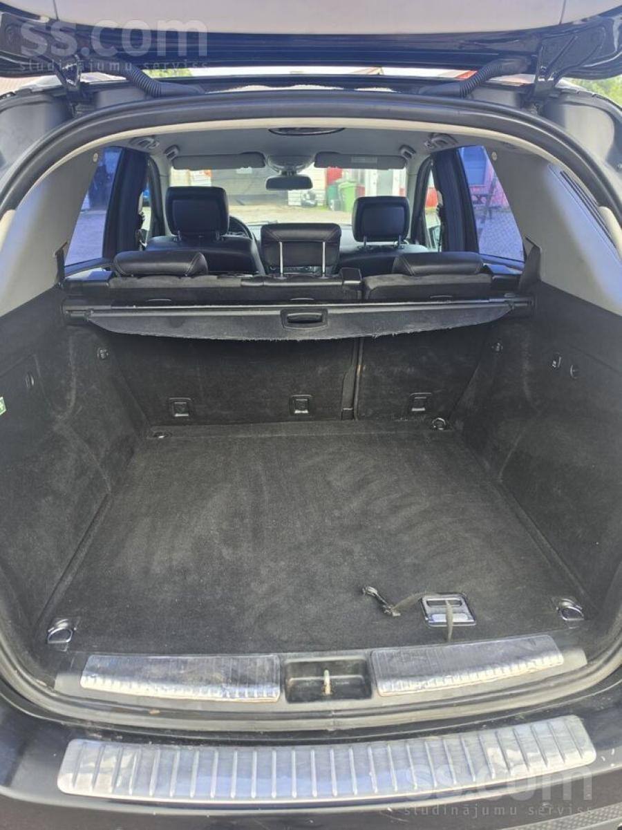 Black Mercedes-Benz ML 320 2007 in Riga, with an engine capacity of 3.00 L and mileage of 300 thousand km for 4200 €, photo 8 on AUTOMOTO.COM.LV