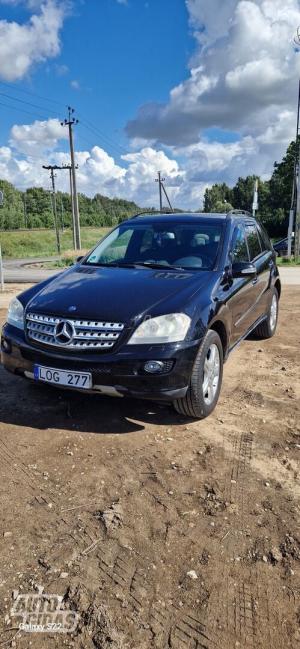 Black Mercedes-Benz ML 320 2007 in Siauliai, with an engine capacity of 3.00 L and mileage of 358 thousand km for 4099 €, photo  on AUTOMOTO.COM.LV