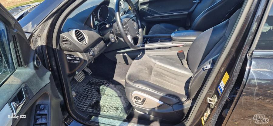 Black Mercedes-Benz ML 320 2007 in Siauliai, with an engine capacity of 3.00 L and mileage of 358 thousand km for 4099 €, photo 13 on AUTOMOTO.COM.LV