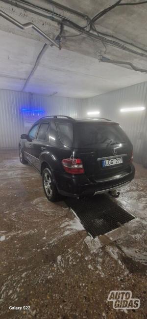Black Mercedes-Benz ML 320 2007 in Siauliai, with an engine capacity of 3.00 L and mileage of 358 thousand km for 4099 €, photo 27 on AUTOMOTO.COM.LV