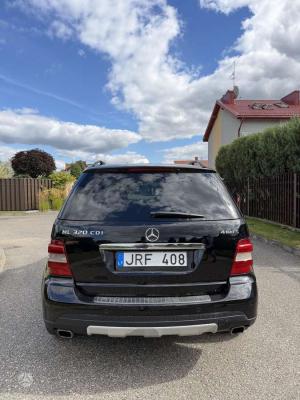 Black Mercedes-Benz ML 320 2007 in Vilnius, with an engine capacity of 2.99 L and mileage of 425 thousand km for 3900 €, photo 7 on AUTOMOTO.COM.LV
