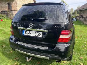 Black Mercedes-Benz ML 320 2007 in Saldus, with an engine capacity of 3.00 L and mileage of 320 thousand km for 5300 €, photo 6 on AUTOMOTO.COM.LV