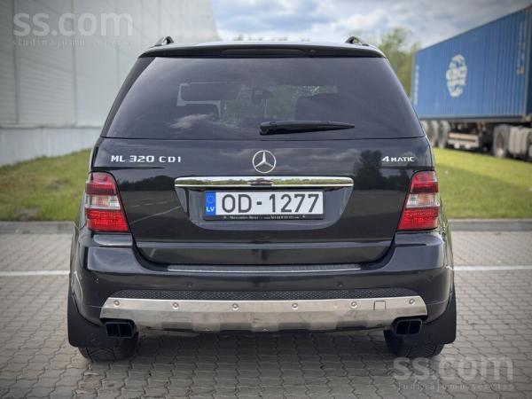Black Mercedes-Benz ML 320 2008 in Riga, with an engine capacity of 3.00 L and mileage of 239 thousand km for 750 €, photo 7 on AUTOMOTO.COM.LV