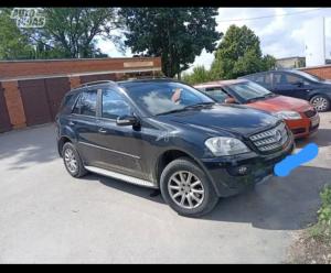Black Mercedes-Benz ML 320 2008 in Radviliskis, with an engine capacity of 3.00 L and mileage of 320 thousand km for 5150 €, photo  on AUTOMOTO.COM.LV