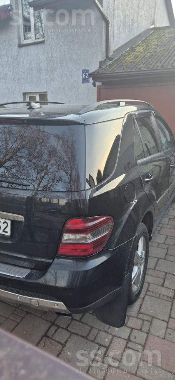 Black Mercedes-Benz ML 320 2008 in Riga, with an engine capacity of 3.00 L and mileage of 260 thousand km for 6200 €, photo 1 on AUTOMOTO.COM.LV