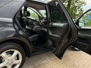 Black Mercedes-Benz ML 320 2008 in Riga, with an engine capacity of 3.00 L and mileage of 0 thousand km for 6850 €, photo 23 on AUTOMOTO.COM.LV
