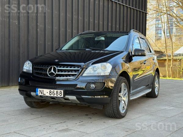 Black Mercedes-Benz ML 320 2008 in Riga, with an engine capacity of 3.00 L and mileage of 244 thousand km for 8090 €, photo 1 on AUTOMOTO.COM.LV
