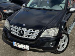Black Mercedes-Benz ML 320 2008 in Vilnius, with an engine capacity of 0.00 L and mileage of 298 thousand km for 6490 €, photo 5 on AUTOMOTO.COM.LV
