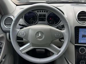 Black Mercedes-Benz ML 320 2008 in Vilnius, with an engine capacity of 0.00 L and mileage of 298 thousand km for 6490 €, photo 23 on AUTOMOTO.COM.LV