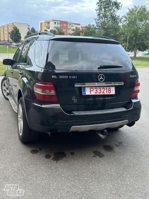 Black Mercedes-Benz ML 320 2008 in Sirvintos, with an engine capacity of 3.00 L and mileage of 304 thousand km for 2850 €, photo 9 on AUTOMOTO.COM.LV