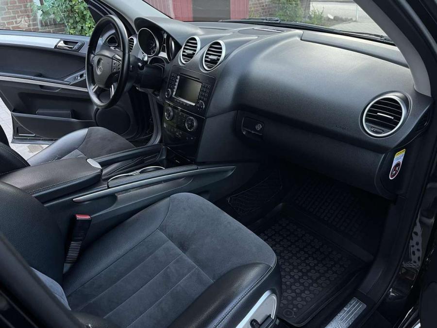 Black Mercedes-Benz ML 320 2008 in Klaipeda, with an engine capacity of 0.00 L and mileage of 306 thousand km for 5500 €, photo 18 on AUTOMOTO.COM.LV