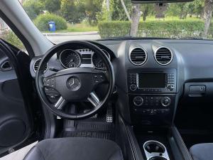 Black Mercedes-Benz ML 320 2008 in Klaipeda, with an engine capacity of 0.00 L and mileage of 306 thousand km for 5500 €, photo 21 on AUTOMOTO.COM.LV