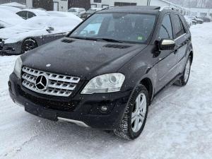 Black Mercedes-Benz ML 320 2009 in Utena, with an engine capacity of 3.00 L and mileage of 280 thousand km for 7270 €, photo 2 on AUTOMOTO.COM.LV