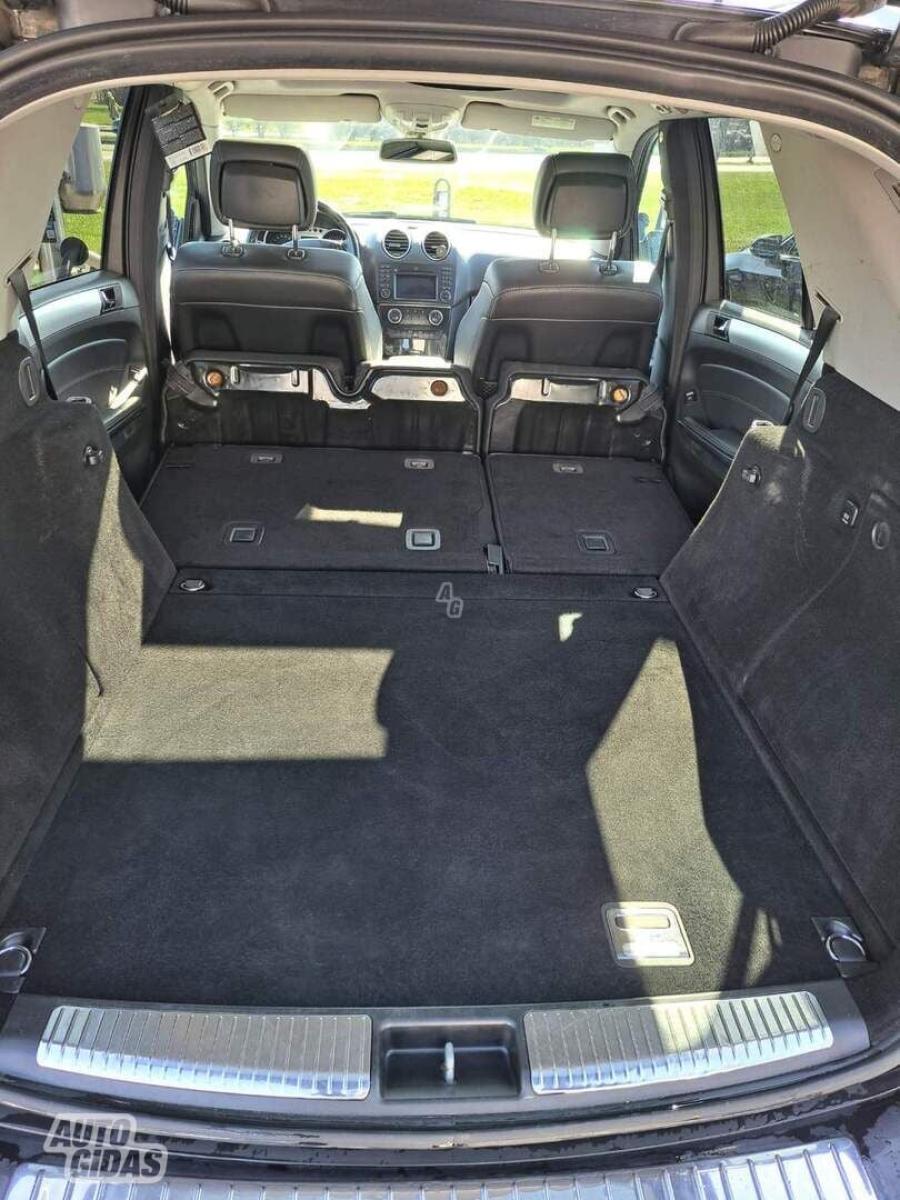 Black Mercedes-Benz ML 320 2009 in Klaipeda, with an engine capacity of 3.00 L and mileage of 338 thousand km for 8300 €, photo 11 on AUTOMOTO.COM.LV
