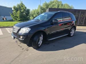 Black Mercedes-Benz ML 320 2009 in Ogre, with an engine capacity of 3.00 L and mileage of 372 thousand km for 7900 €, photo 13 on AUTOMOTO.COM.LV