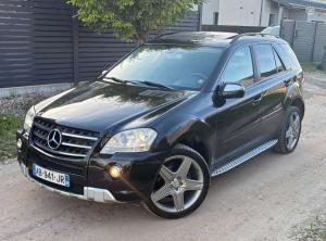 Black Mercedes-Benz ML 320 2009 in Vilnius, with an engine capacity of 3.00 L and mileage of 260 thousand km for 9200 €, photo  on AUTOMOTO.COM.LV