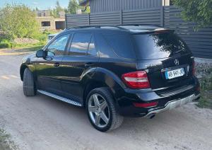 Black Mercedes-Benz ML 320 2009 in Vilnius, with an engine capacity of 3.00 L and mileage of 260 thousand km for 9200 €, photo 19 on AUTOMOTO.COM.LV