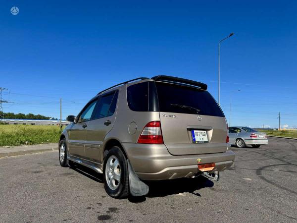 Brown Mercedes-Benz ML 320 2002 in Panevezys, with an engine capacity of 3.20 L and mileage of 252 thousand km for 1499 €, photo 7 on AUTOMOTO.COM.LV