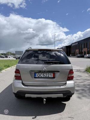 Grey Mercedes-Benz ML 320 2006 in Kaunas, with an engine capacity of 2.99 L and mileage of 335 thousand km for 3900 €, photo 14 on AUTOMOTO.COM.LV