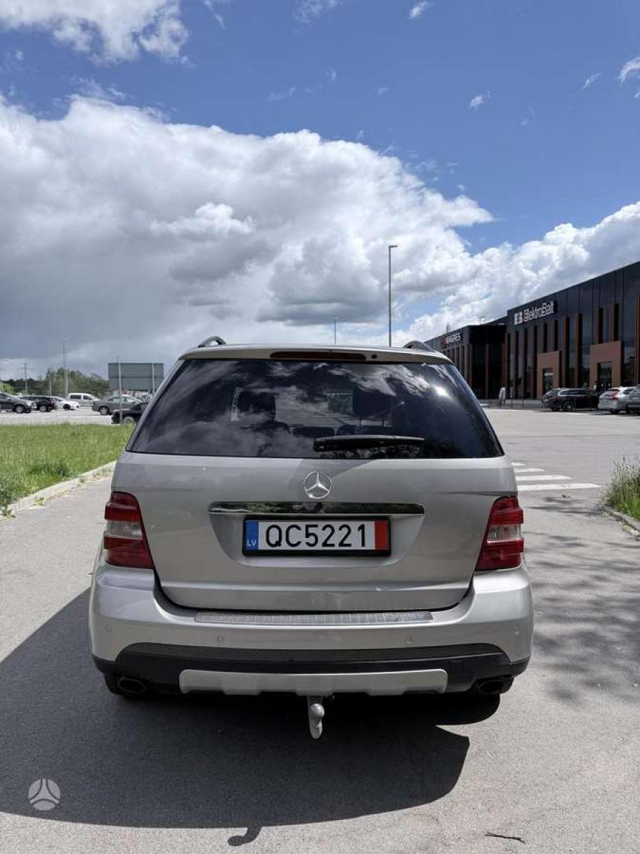 Grey Mercedes-Benz ML 320 2006 in Kaunas, with an engine capacity of 2.99 L and mileage of 335 thousand km for 3900 €, photo 14 on AUTOMOTO.COM.LV