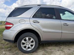 Grey Mercedes-Benz ML 320 2006 in Siauliai, with an engine capacity of 2.99 L and mileage of 459 thousand km for 3350 €, photo 12 on AUTOMOTO.COM.LV