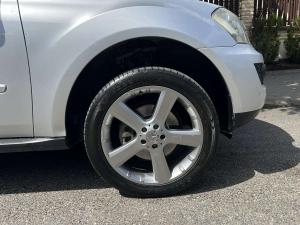 Grey Mercedes-Benz ML 320 2011 in Vilnius, with an engine capacity of 3.20 L and mileage of 230 thousand km for 6600 €, photo 12 on AUTOMOTO.COM.LV