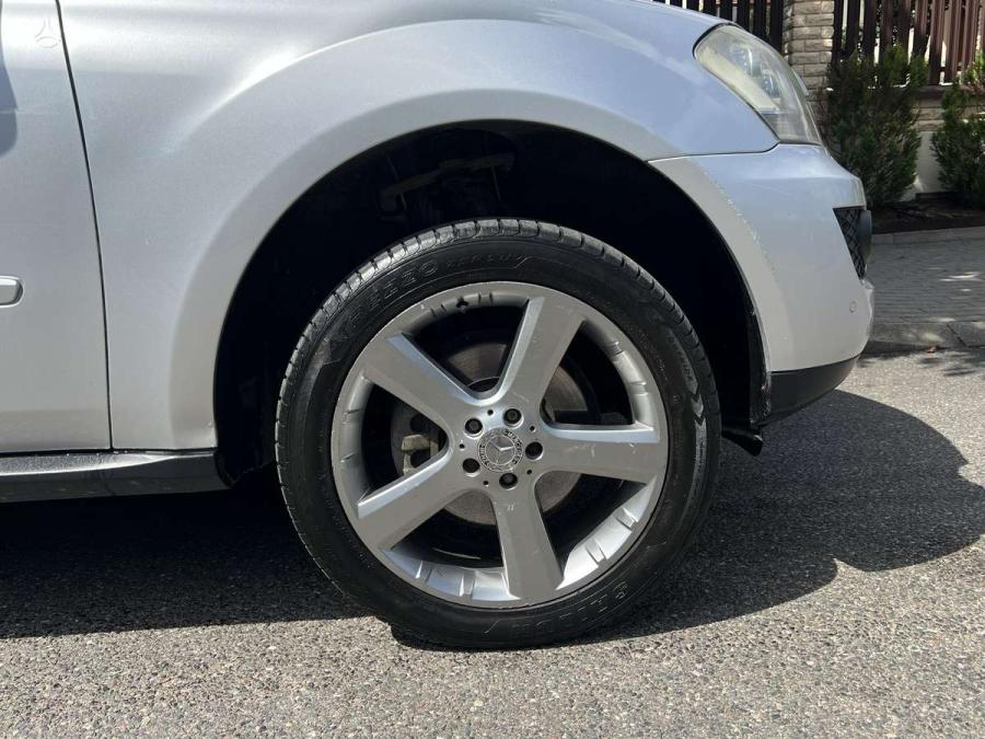 Grey Mercedes-Benz ML 320 2011 in Vilnius, with an engine capacity of 3.20 L and mileage of 230 thousand km for 6600 €, photo 12 on AUTOMOTO.COM.LV