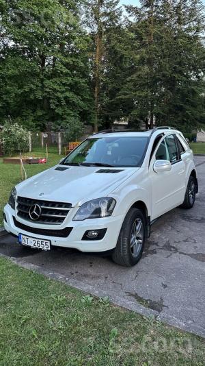 Balts Mercedes-Benz ML 320 2009 Dobele, ar dzinēja tilpumu 3.00 L un nobraukumu 387 tūkst. km par 6000 €, foto  vietnē AUTOMOTO.COM.LV