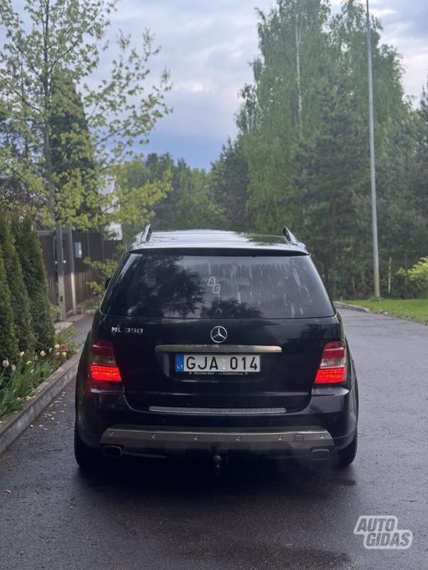 Black Mercedes-Benz ML 350 2006 in Vilnius, with an engine capacity of 3.50 L and mileage of 207 thousand km for 2490 €, photo 5 on AUTOMOTO.COM.LV