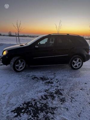 Black Mercedes-Benz ML 350 2008 in Siauliai, with an engine capacity of 3.50 L and mileage of 290 thousand km for 6100 €, photo 3 on AUTOMOTO.COM.LV