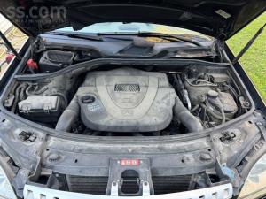 Black Mercedes-Benz ML 350 2008 in Riga, with an engine capacity of 3.50 L and mileage of 205 thousand km for 5000 €, photo 18 on AUTOMOTO.COM.LV