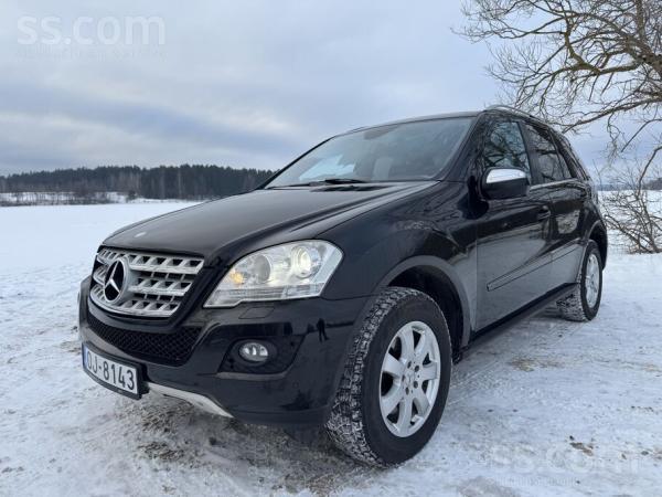 Black Mercedes-Benz ML 350 2009 in Ogre, with an engine capacity of 3.00 L and mileage of 307 thousand km for 8400 €, photo 2 on AUTOMOTO.COM.LV