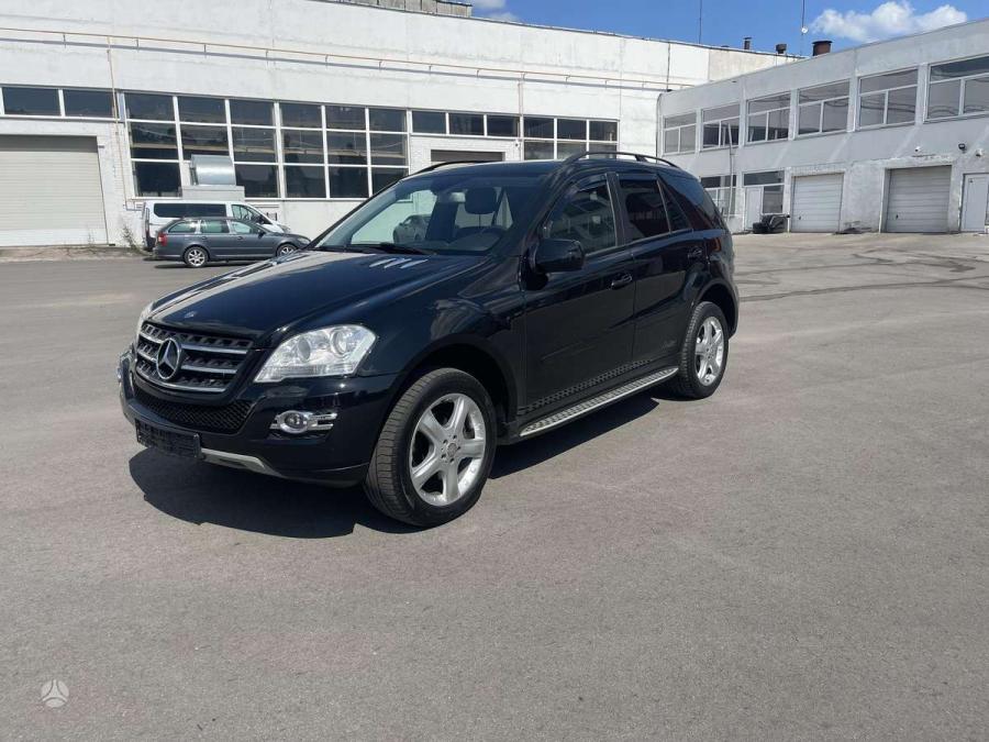 Black Mercedes-Benz ML 350 2009 in Marijampole, with an engine capacity of 3.00 L and mileage of 254 thousand km for 8800 €, photo 1 on AUTOMOTO.COM.LV
