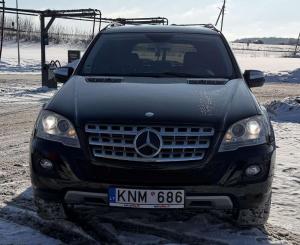 Black Mercedes-Benz ML 350 2010 in Kaunas, with an engine capacity of 2.99 L and mileage of 291 thousand km for 9900 €, photo  on AUTOMOTO.COM.LV