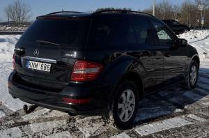 Black Mercedes-Benz ML 350 2010 in Kaunas, with an engine capacity of 2.99 L and mileage of 291 thousand km for 9900 €, photo 5 on AUTOMOTO.COM.LV
