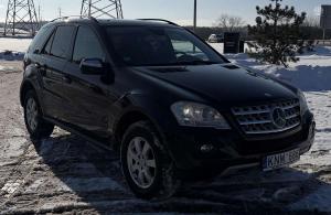 Black Mercedes-Benz ML 350 2010 in Kaunas, with an engine capacity of 2.99 L and mileage of 291 thousand km for 9900 €, photo 7 on AUTOMOTO.COM.LV