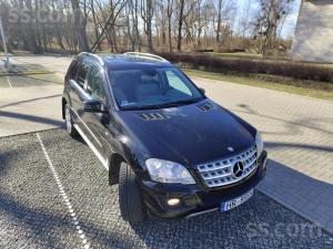 Black Mercedes-Benz ML 350 2010 in Liepaja, with an engine capacity of 3.00 L and mileage of 289 thousand km for 7900 €, photo  on AUTOMOTO.COM.LV