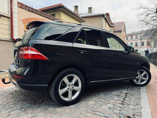 Black Mercedes-Benz ML 350 2012 in Cesis, with an engine capacity of 3.00 L and mileage of 0 thousand km for 14990 €, photo 6 on AUTOMOTO.COM.LV
