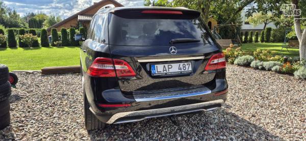 Black Mercedes-Benz ML 350 2012 in Kaunas, with an engine capacity of 3.00 L and mileage of 350 thousand km for 13000 €, photo 3 on AUTOMOTO.COM.LV