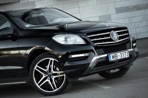 Black Mercedes-Benz ML 350 2012 in Riga, with an engine capacity of 3.50 L and mileage of 229 thousand km for 21990 €, photo 26 on AUTOMOTO.COM.LV