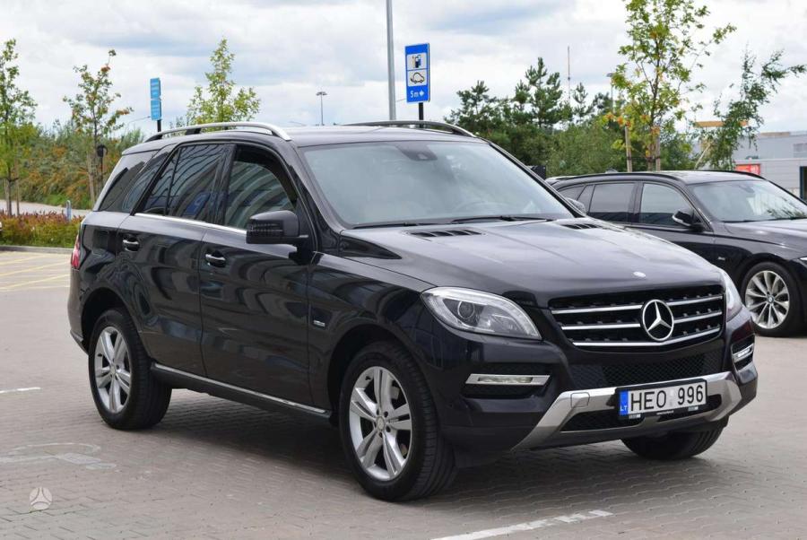 Black Mercedes-Benz ML 350 2012 in Vilnius, with an engine capacity of 2.99 L and mileage of 315 thousand km for 11500 €, photo 4 on AUTOMOTO.COM.LV