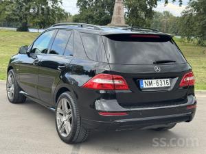 Black Mercedes-Benz ML 350 2012 in Riga, with an engine capacity of 3.00 L and mileage of 0 thousand km for 11950 €, photo 4 on AUTOMOTO.COM.LV