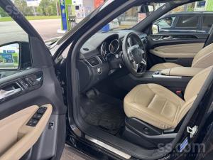 Black Mercedes-Benz ML 350 2012 in Riga, with an engine capacity of 3.00 L and mileage of 0 thousand km for 11950 €, photo 7 on AUTOMOTO.COM.LV