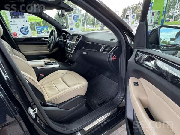 Black Mercedes-Benz ML 350 2012 in Riga, with an engine capacity of 3.00 L and mileage of 0 thousand km for 11950 €, photo 9 on AUTOMOTO.COM.LV