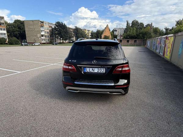 Мерседес МЛ 350 2012 в Кедайняй на AUTOMOTO.COM.LV Черный Мерседес МЛ 350 2012 в Кедайняй, объемом двигателя 2.99 л и пробегом 265 тыс. км за 13500 €, фото 11 на AUTOMOTO.COM.LV