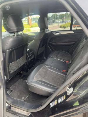 Black Mercedes-Benz ML 350 2013 in Kaunas, with an engine capacity of 2.99 L and mileage of 344 thousand km for 11490 €, photo 7 on AUTOMOTO.COM.LV