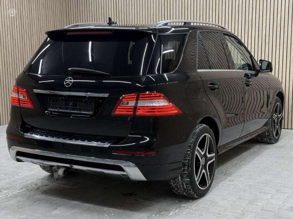 Black Mercedes-Benz ML 350 2014 in Marijampole, with an engine capacity of 2.99 L and mileage of 231 thousand km for 16850 €, photo 8 on AUTOMOTO.COM.LV